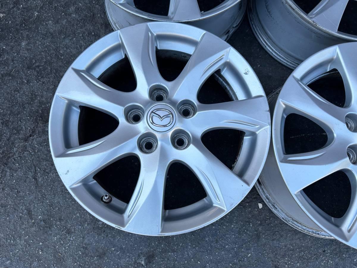 ZappAds: Mazda 3 aluminum 16 inch rims 5 lugs. One is bent. $60 each