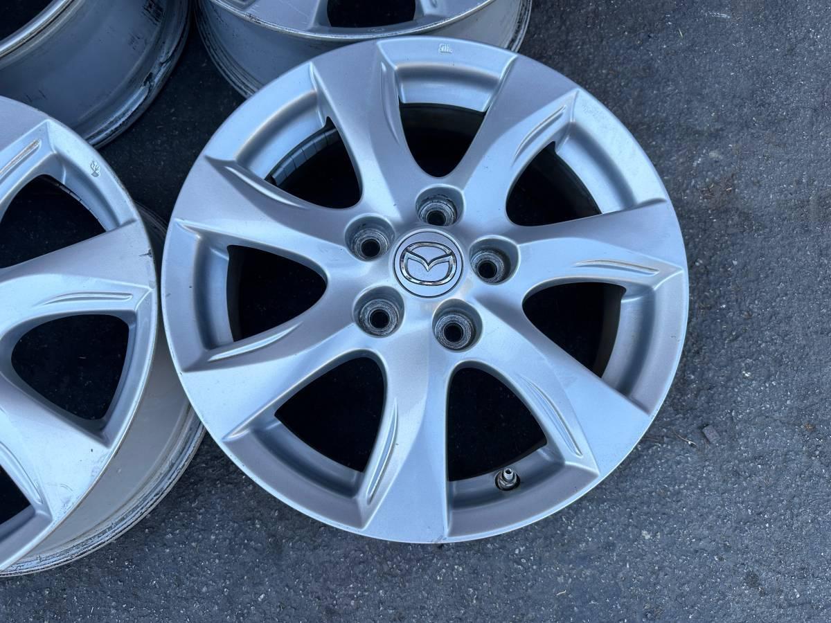 ZappAds: Mazda 3 aluminum 16 inch rims 5 lugs. One is bent. $60 each