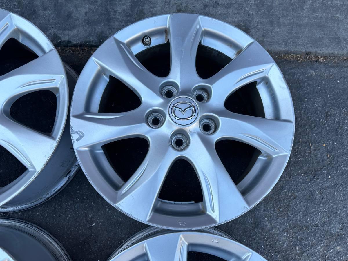ZappAds: Mazda 3 aluminum 16 inch rims 5 lugs. One is bent. $60 each