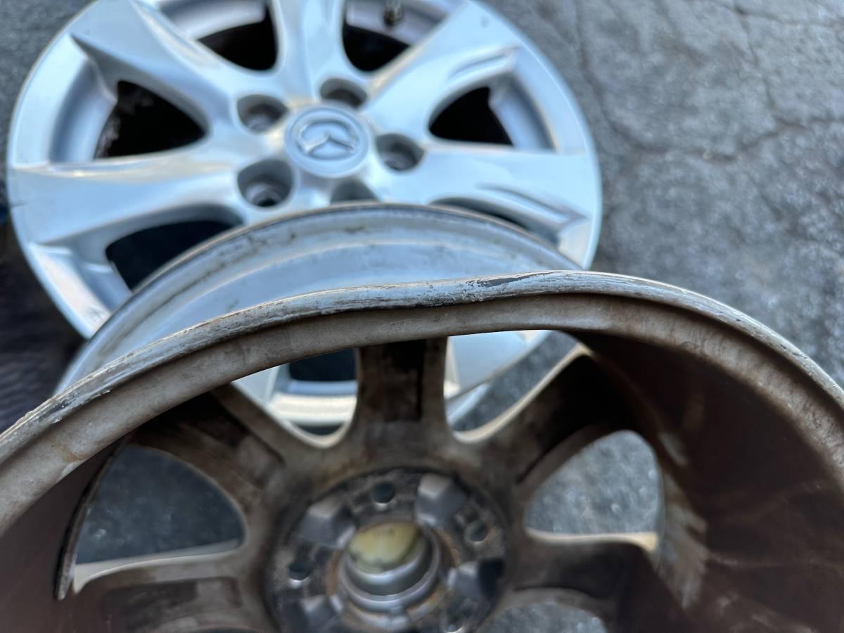 ZappAds: Mazda 3 aluminum 16 inch rims 5 lugs. One is bent. $60 each